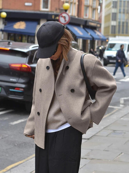 Loose-fitting women's jacket, stretch fabric, button closure ...